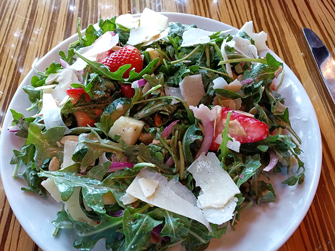 Strawberry arugula salad topped with shaved parmesan, because sometimes vegetables deserve to feel fancy too.