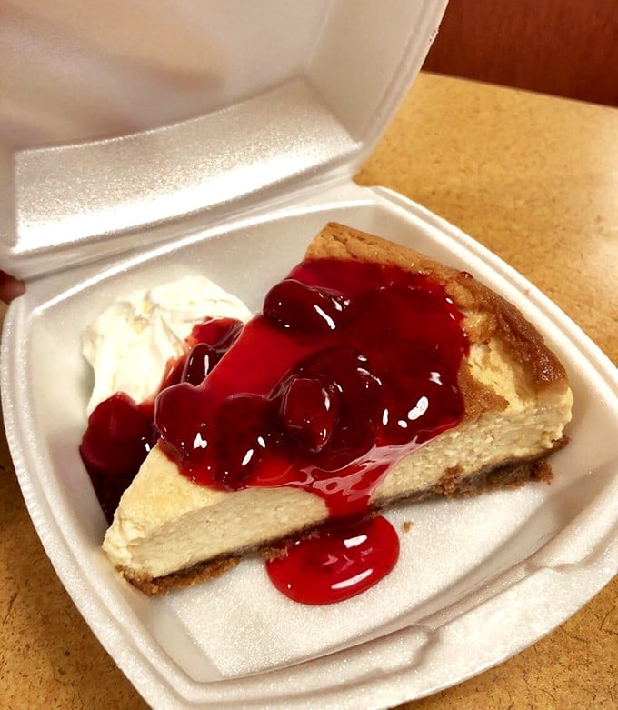 Cheesecake that doesn't just satisfy your sweet tooth—it throws a party for it, complete with a berry sauce red carpet.