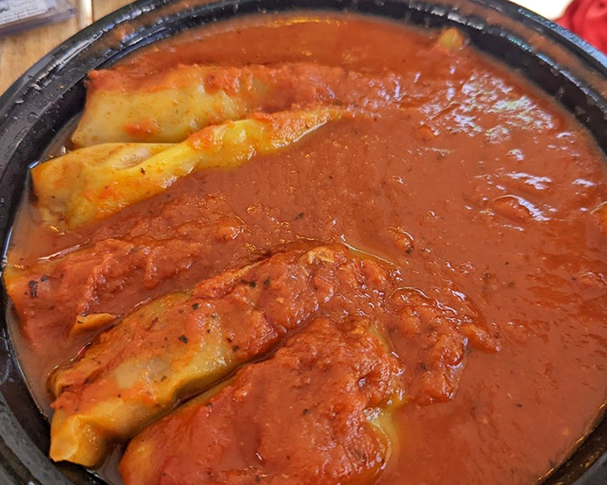 Stuffed banana peppers swimming in marinara&mdash;a spicy-tangy flavor bomb that's worth every potential heartburn moment later.