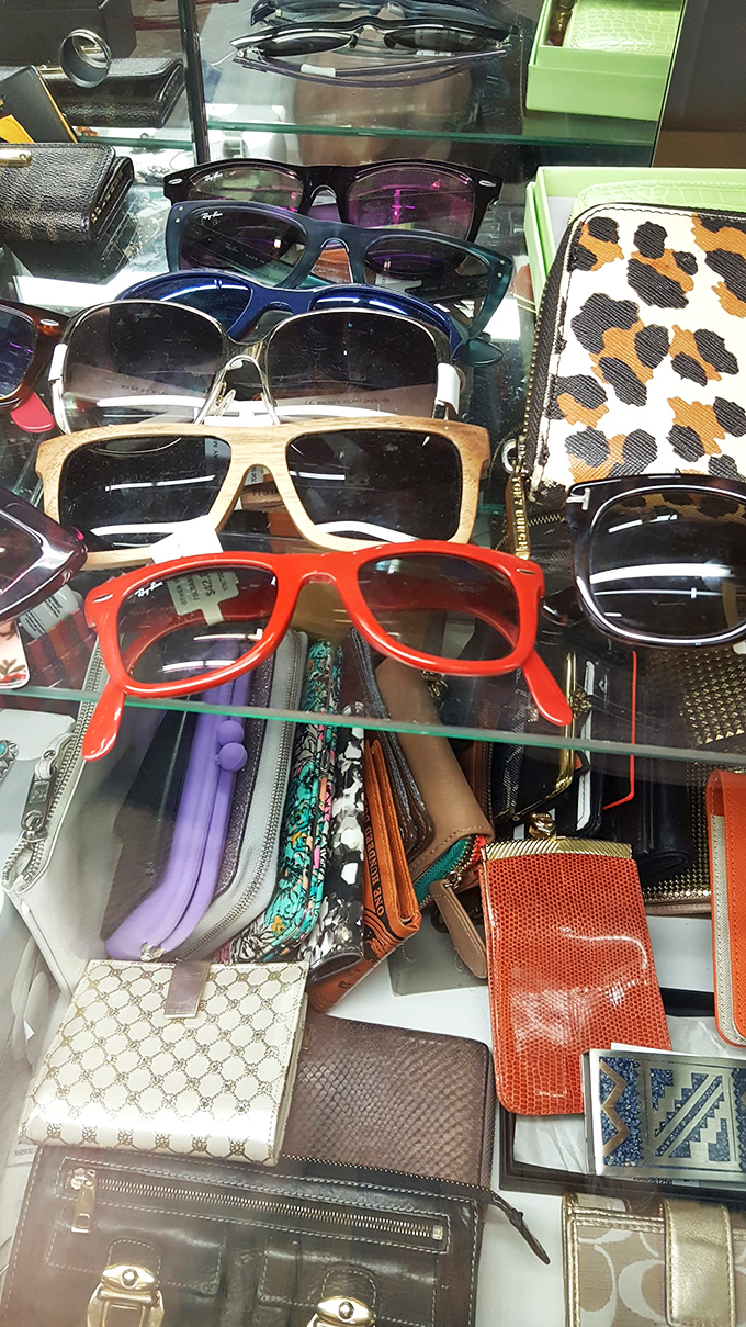 Sunglasses and wallets displayed like a museum of everyday treasures &ndash; Ray-Bans next to no-names, all waiting for their second act.