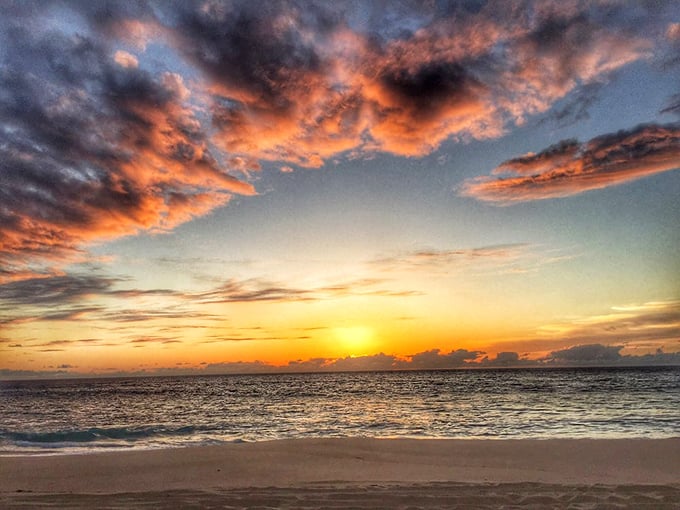 Kauai sunsets don't just happen &ndash; they perform. The sky putting on its nightly spectacular that no smartphone camera will ever truly capture.