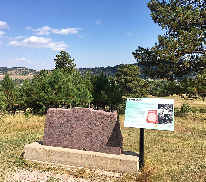 The Thoen Stone Monument marks a fascinating piece of Black Hills history, standing quietly while tourists rush toward flashier attractions.
