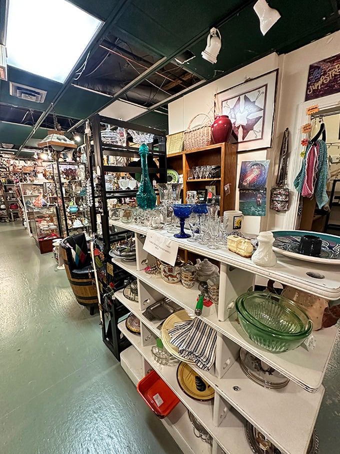 A white-shelved wonderland of glass and crystal catching the light. Depression glass never looked so happy to see you.