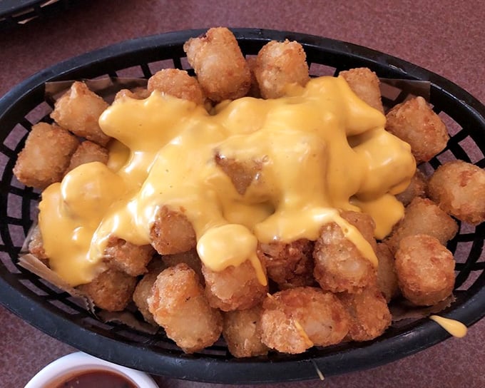 Tots wearing a cheese tuxedo&mdash;dressed to impress and ready to party in your mouth. The ultimate upgrade to childhood's favorite potato format.