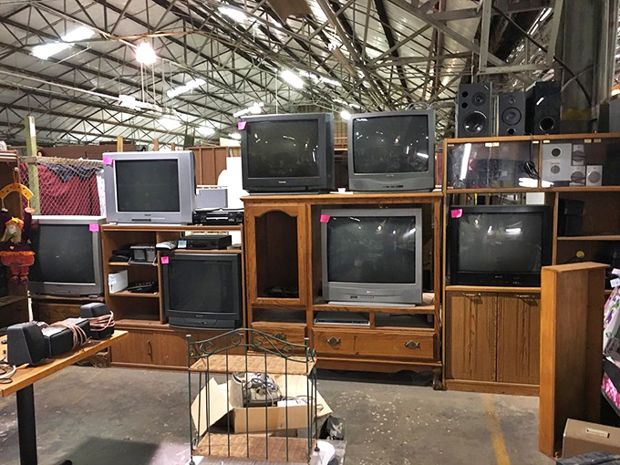 Television history stacked high &ndash; these aren't just outdated electronics, they're time capsules of evenings spent watching favorite shows together.