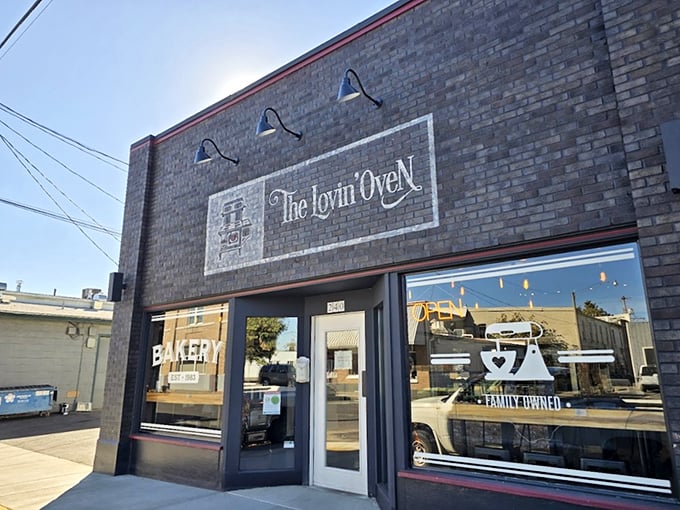 The Lovin' Oven bakery window displays treats that make your diet plans disappear faster than teenagers when chores are mentioned.