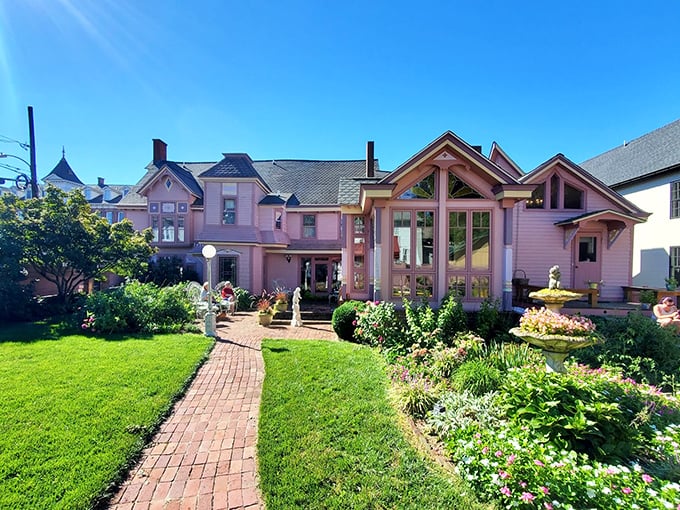 The Towers Bed & Breakfast's pink Victorian splendor looks like it was plucked from a fairy tale and planted amid perfectly manicured gardens.