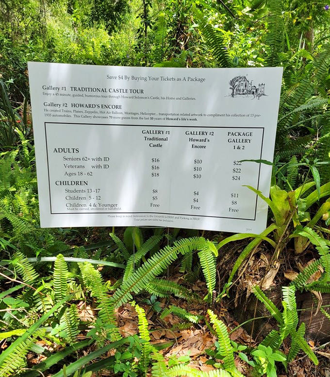 Nature provides the perfect backdrop for this practical information. The ferns seem to be guarding the secret to affordable admission.
