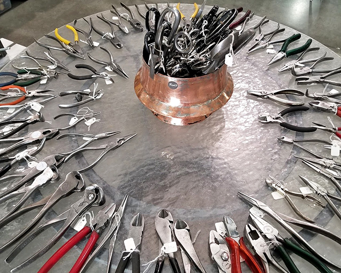 The circle of pliers—a metalworker's dream or a dentist's nightmare? Each tool waiting for the right pair of hands to bring it back to life.
