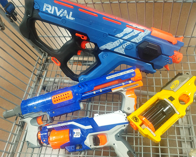 Nerf arsenal ready for adoption. Some kid is about to have the best backyard battles ever, all thanks to their savvy bargain-hunting parents. 