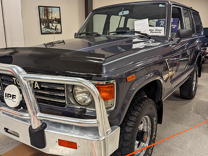 This vintage Toyota Land Cruiser sits majestically indoors, making every passing car enthusiast stop and whisper, "They just don't make 'em like this anymore."