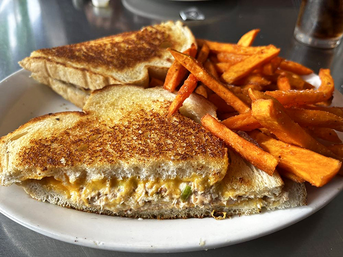 This tuna melt is playing the greatest hits album of diner classics&mdash;golden bread, melty cheese, and a side of sweet potato fries.