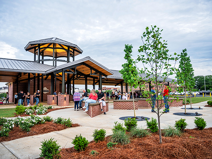 The Farmers Market pavilion transforms from simple structure to community gathering place. Food tastes better when you can shake the hand that grew it.