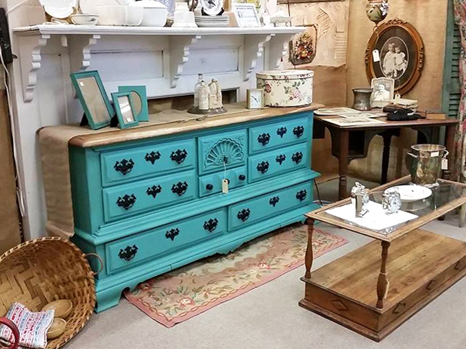 That turquoise dresser just sitting there, confidently waiting for someone bold enough to take it home and own it.