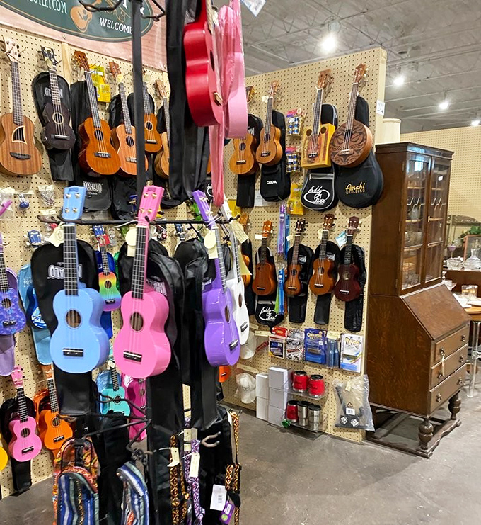 Ukuleles in candy colors hanging like tropical fruit, promising that yes, even you could learn "Somewhere Over the Rainbow."