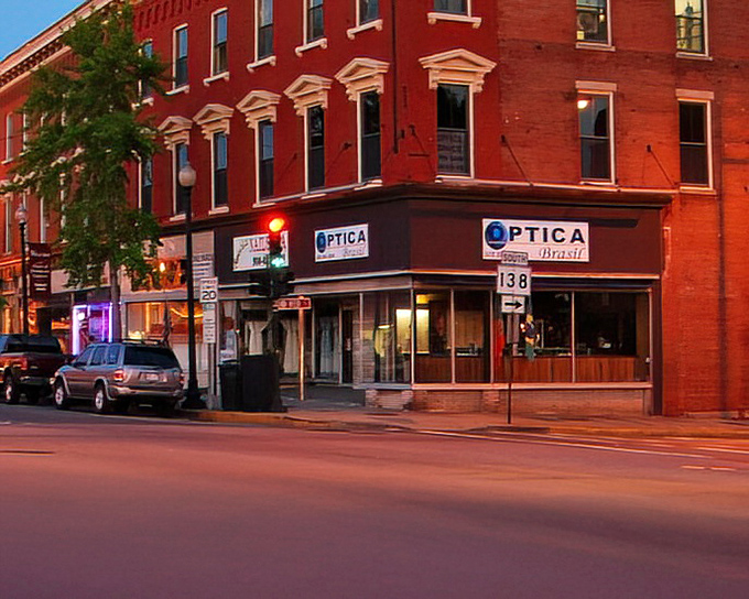 Evening settles on Union Block, where the warm glow of storefronts welcomes night visitors. The brick practically radiates stories collected over decades.