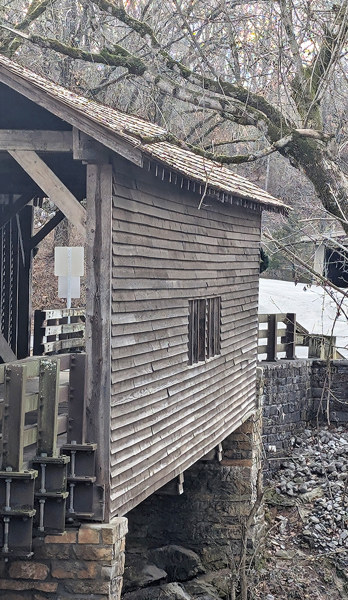 Weathered wooden siding tells stories of countless seasons. If these planks could talk, they'd have 150 years of gossip to share.