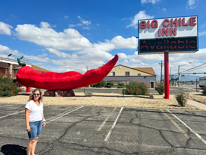 The scale becomes apparent when visitors pose beside the massive chile, creating the perfect "you won't believe what I saw" vacation photo.