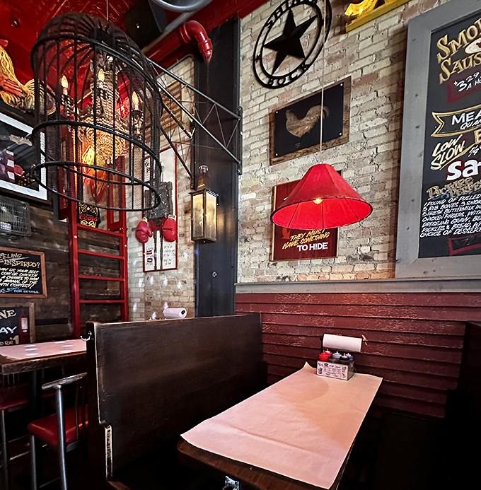 Every inch tells a story&mdash;exposed brick, red accents, and vintage-inspired lighting create the perfect backdrop for the meat-centric drama about to unfold.