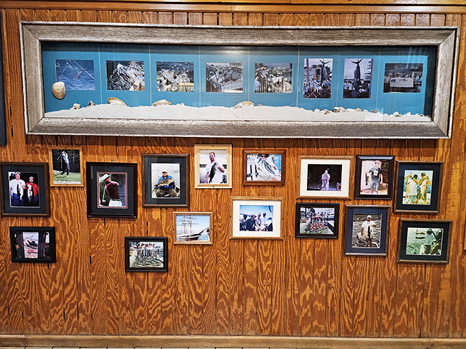 A wall of memories and fishing triumphs that tells you this place is woven into the community's fabric – not just a restaurant, but a local landmark.