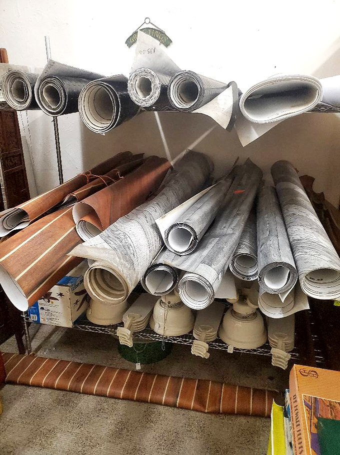 Wallpaper rolls and vintage fixtures await their second act. Someone's renovation project is about to get a serious dose of character.
