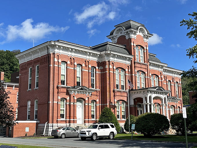 The Wayne County Courthouse commands respect with its Victorian architecture and red brick grandeur—civic pride manifested in towers and trim.