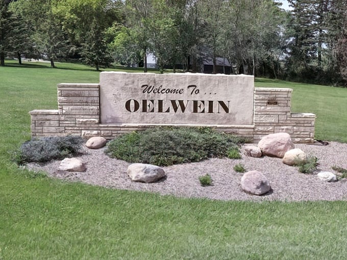 Oelwein's welcome sign doesn't need neon or digital displays&mdash;just like the town itself, it offers straightforward hospitality without unnecessary frills. 