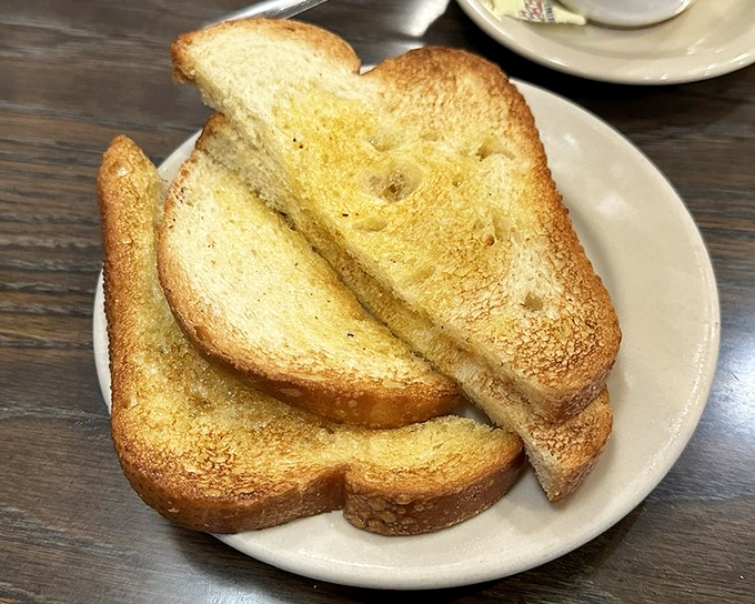 Toast &ndash; the unsung hero of breakfast. Golden, buttery, and ready to soak up egg yolks or jam with equal enthusiasm.