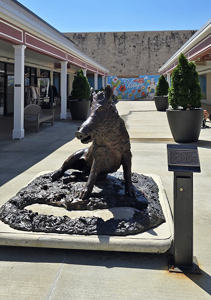 The bronze wild boar statue serves as Prairie Village's unofficial mascot, silently judging your shopping bags while looking surprisingly dignified.