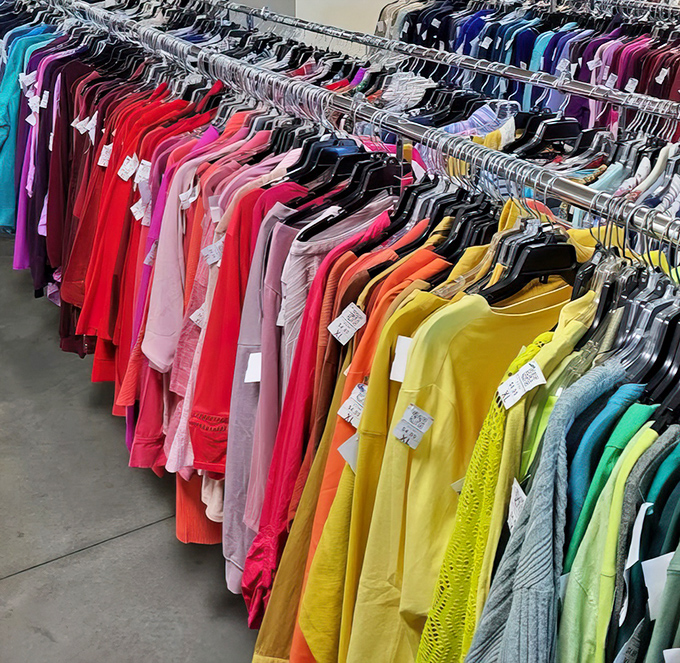 The color-coded clothing section—a rainbow organized by someone with the patience of a saint and the precision of a NASA engineer.