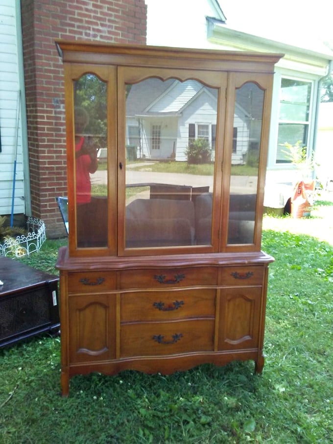 This china cabinet has witnessed more family dinners than Thanksgiving at Grandma's. Just imagine the conversations it's overheard!