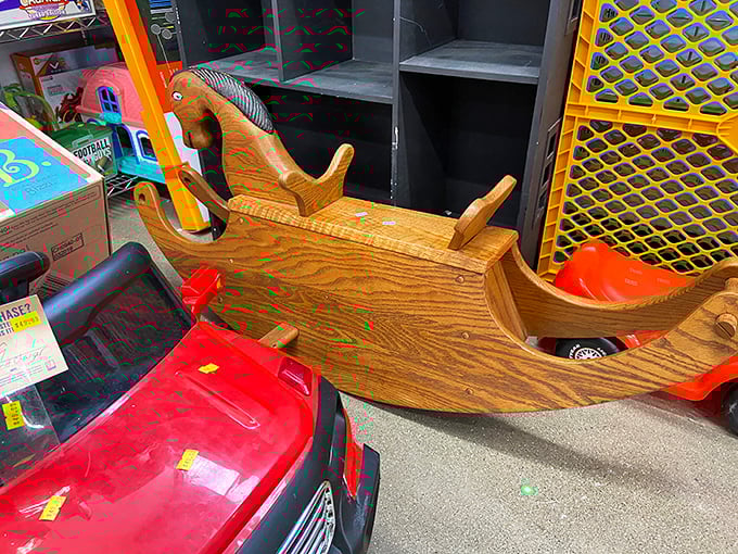 A wooden rocking horse awaits its next young rider. Handcrafted nostalgia that's survived one childhood and is ready for another adventure.