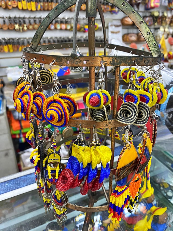 Wearable art from Colombia brightens display cases. These vibrant, handcrafted earrings bring international flair to North Carolina style.