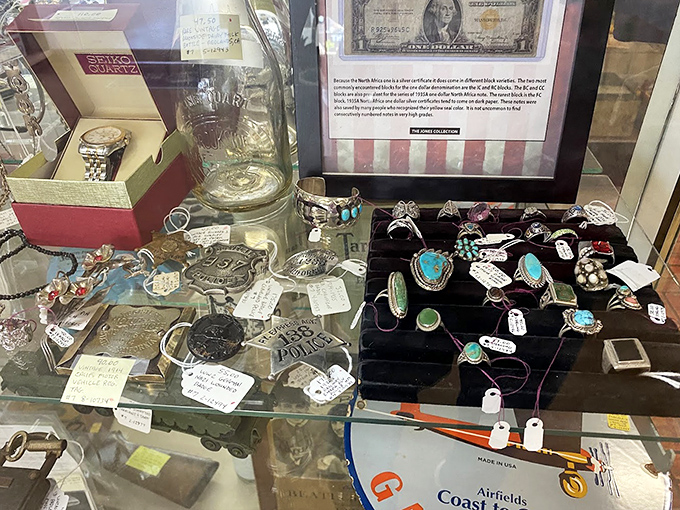 Turquoise-studded silver rings and vintage watches wait patiently in their glass case, ready to adorn new wrists and fingers with old-world charm.