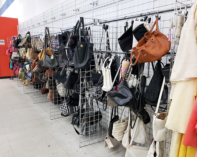 Handbag heaven for accessory enthusiasts - leather, canvas, and synthetic options dangling with potential and personality.