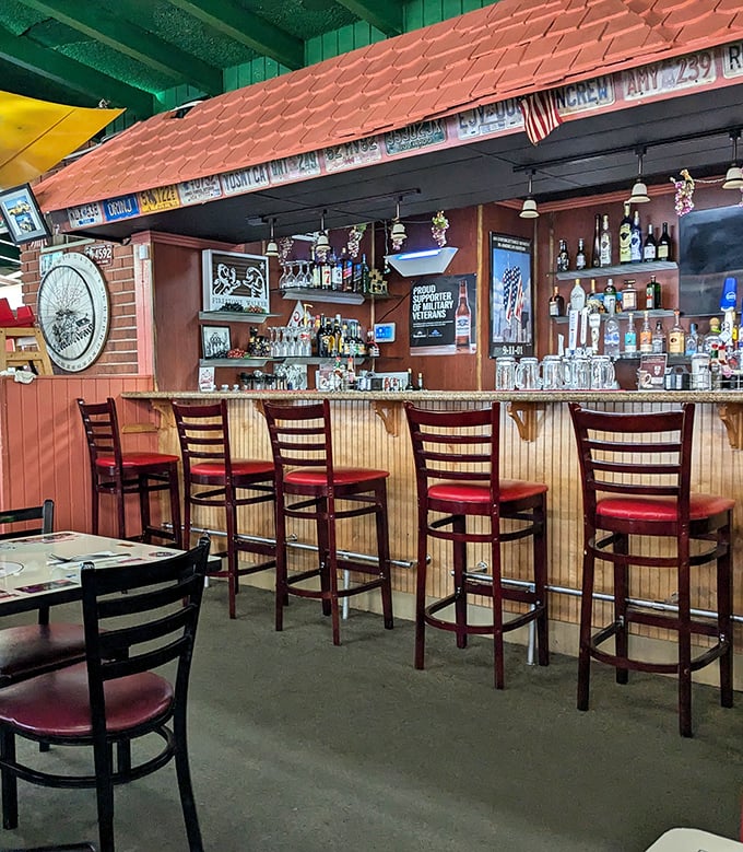The bar where breakfast champions gather. Those red-cushioned stools have supported generations of satisfied diners contemplating their next bite.
