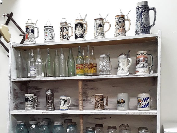 German beer steins stand at attention like ceramic soldiers, each one telling tales of Oktoberfests past and celebrations where these mugs raised many a toast.