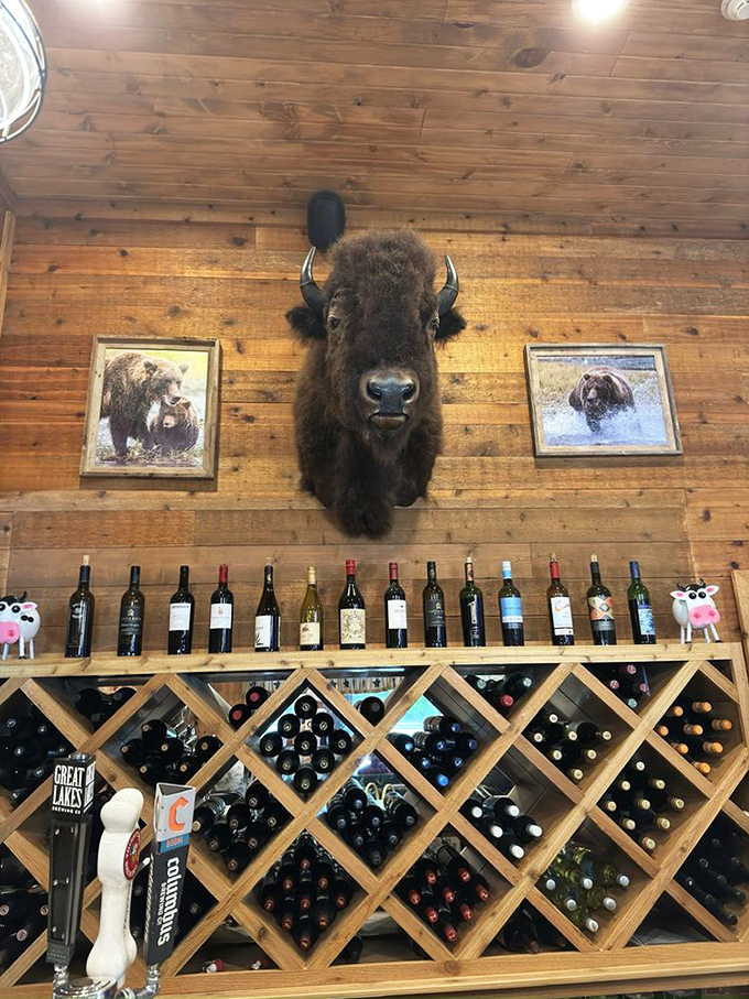 The buffalo head presides over an impressive wine collection &ndash; because nothing pairs better with a primal dining experience than civilization's finest fermented grapes.
