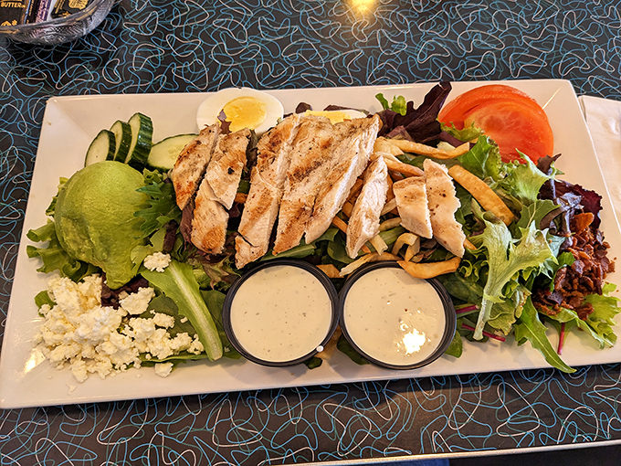 This salad isn't punishment&mdash;it's a celebration with blackened chicken, fresh greens, and dressings that make vegetables worth eating.
