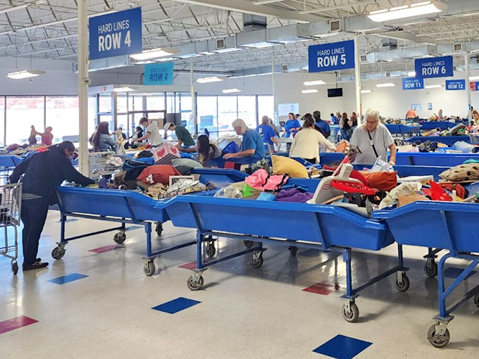 The famous blue bins, organized by row numbers like some wonderful library of possibilities where the Dewey Decimal System is replaced by serendipity.
