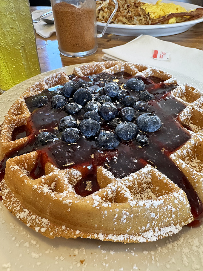 This blueberry waffle isn't just breakfast, it's edible art &ndash; a golden canvas topped with berries that pop like tiny flavor bombs.