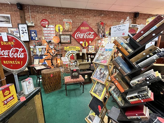 Nostalgia corner: where Coca-Cola memorabilia meets vintage literature. This booth is basically your grandparents' attic, but meticulously organized.