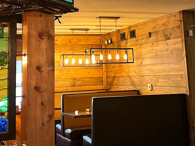 These cozy wooden booths have witnessed more romantic moments and family celebrations than a Hallmark movie marathon.