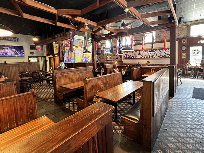 The booth seating offers cozy corners for intimate conversations or boisterous gatherings, each table holding decades of shared stories and memorable meals.