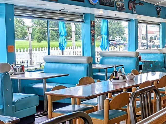 Those turquoise booths by the windows are prime real estate for people-watching while demolishing pancakes.