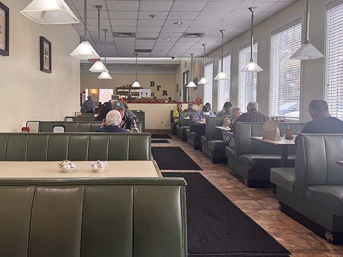 Classic booth seating in that particular shade of green that somehow makes everything taste better&mdash;comfort food deserves comfortable seating.