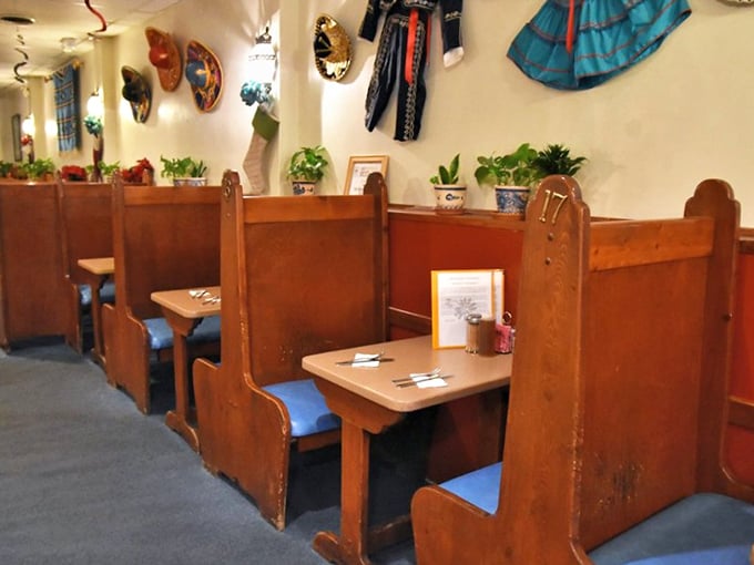 These wooden booths have witnessed countless first bites and food epiphanies. If they could talk, they'd probably just say "order the green chile." 