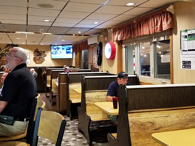 Old-school booth seating that whispers "stay awhile" with its comfortable simplicity. The perfect spot for family dinners and catching up.