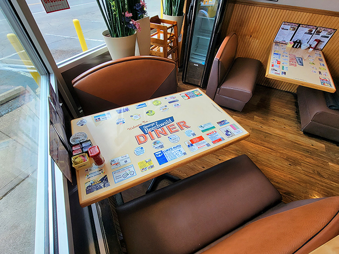 These booths have heard more Columbus stories than a local historian, with tabletops that could write a book about Ohio's breakfast habits.