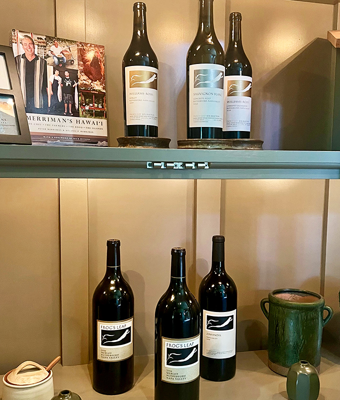 The lineup of Frog's Leap bottles stands ready for tasting, each label promising the kind of wine that makes dinner conversations better.